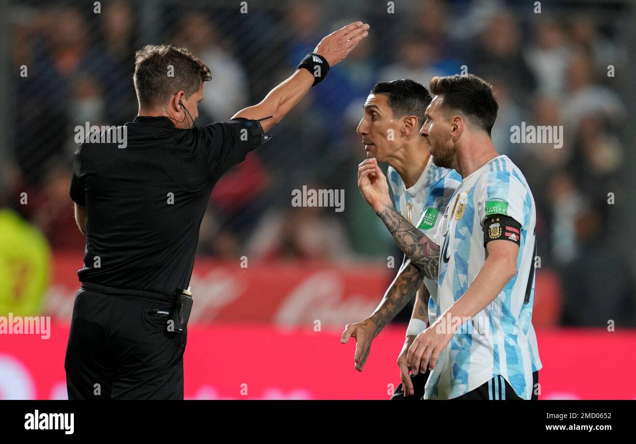 Argentina's Lionel Messi, right, and Angel Di Maria complain to referee ...