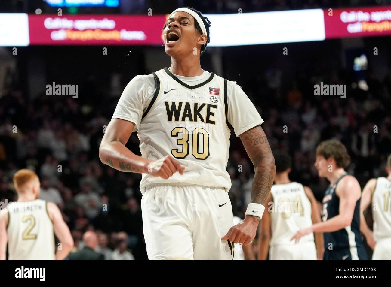 Wake Forest guard Damari Monsanto (30) celebrates his 3-point basket ...