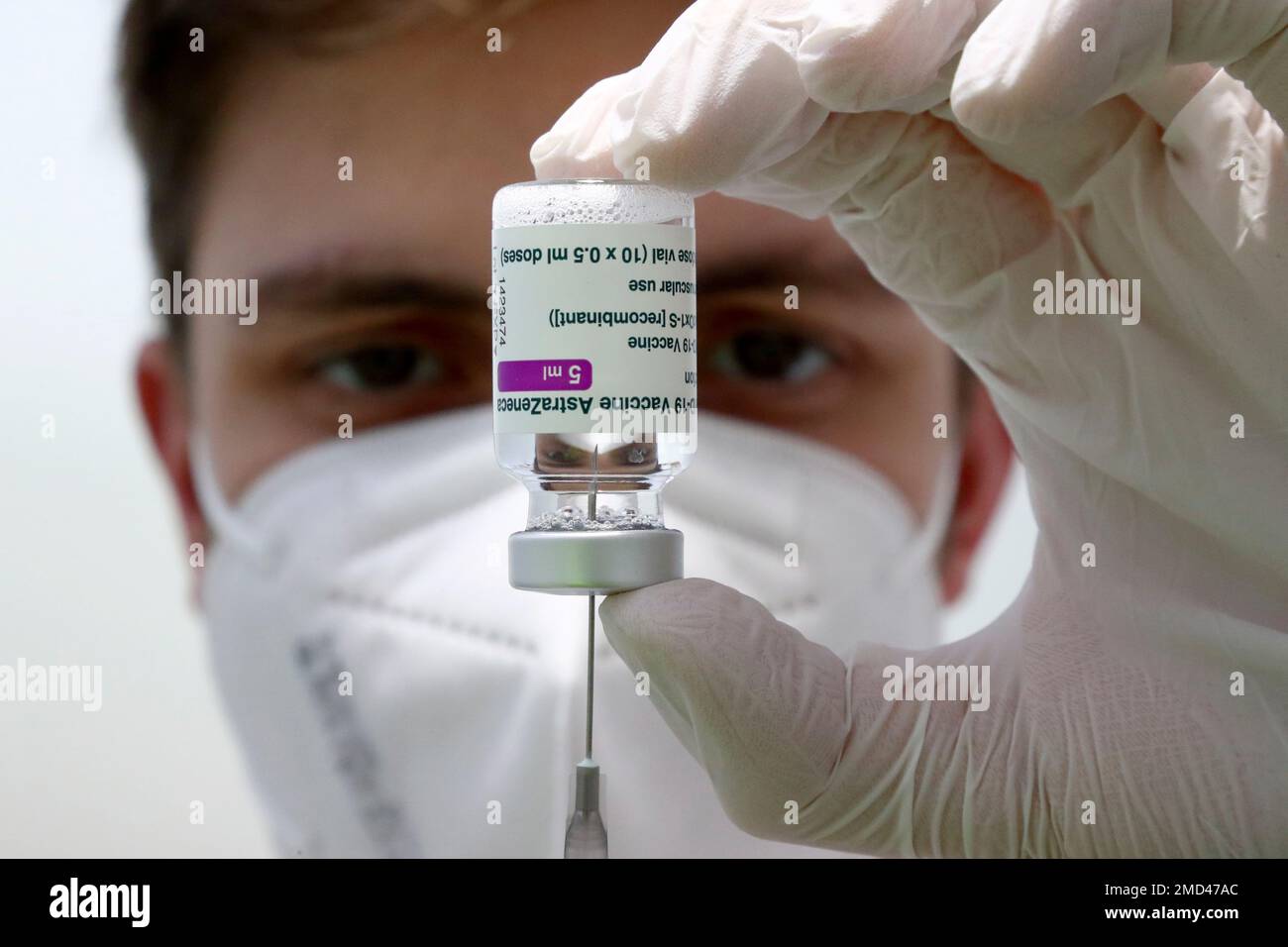 FILE-Medical staff prepares a syringe from a vial of the AstraZeneca ...