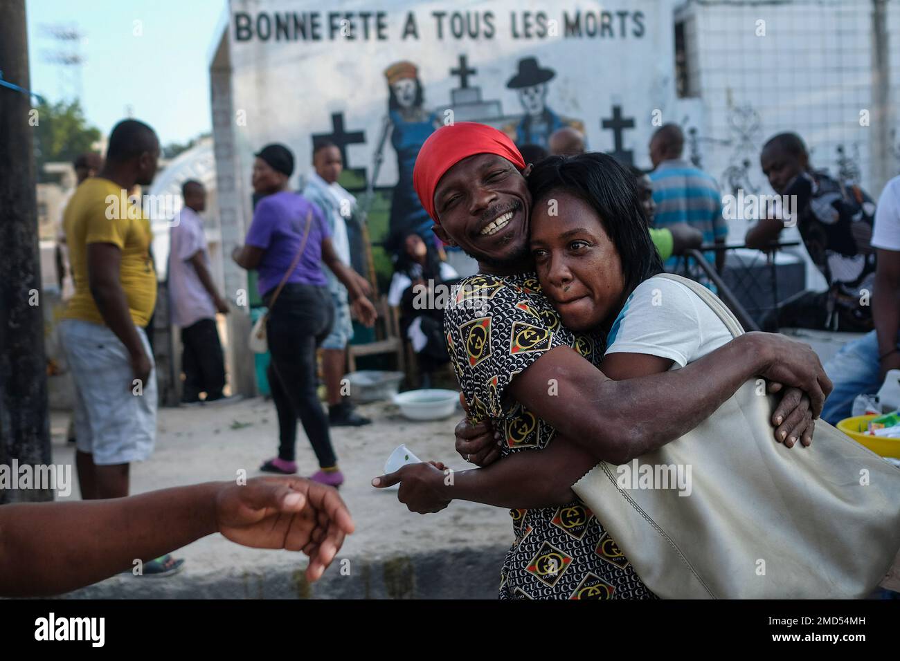 People attend the Fete Gede celebration of spirits holiday at the ...