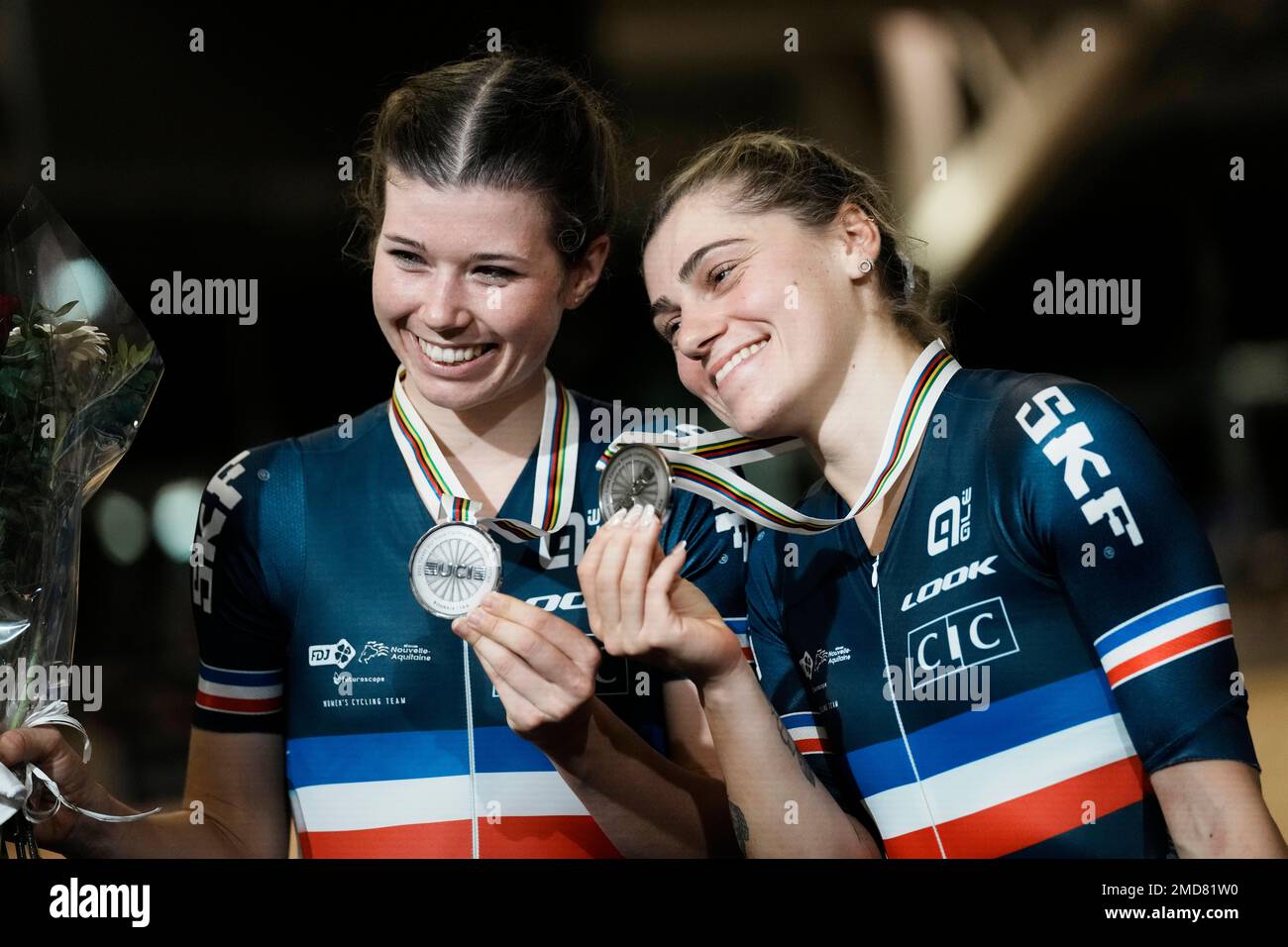 Clara Copponi, left, and Marie Le Net of France pose with their silver ...