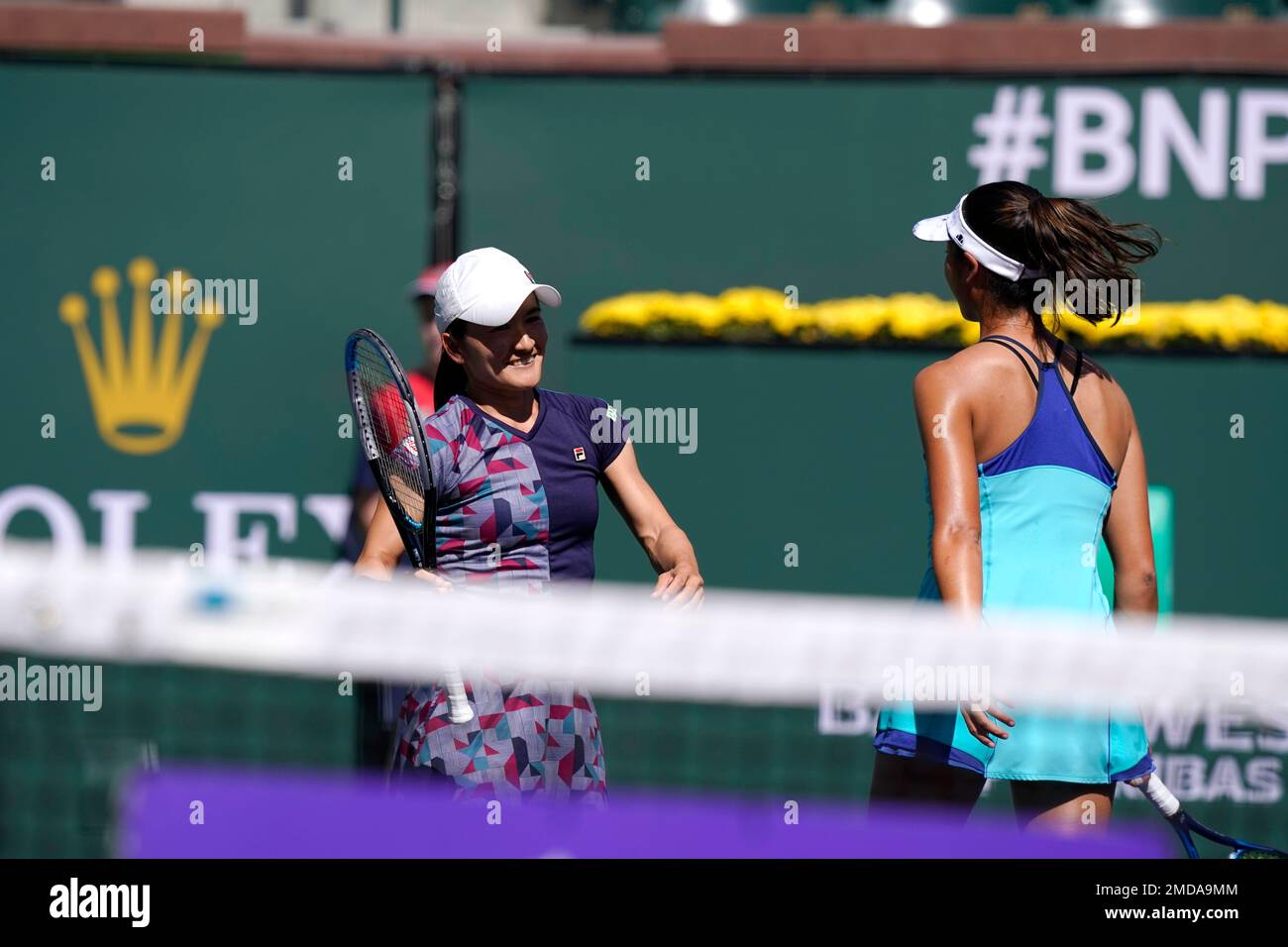 Shuko Aoyama, of Japan, left, greets her doubles partner Ena Shibahara ...