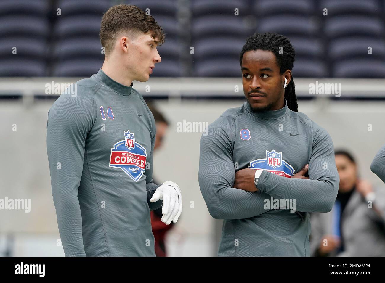 Allgau Comets defensive back Chad Walrond, of Britain, right, speaks ...