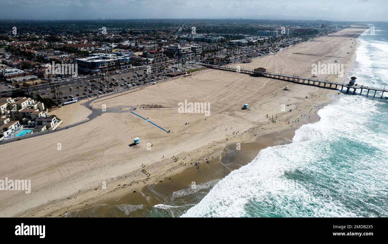 This aerial photo shows a reopened beach in Huntington Beach, Calif ...