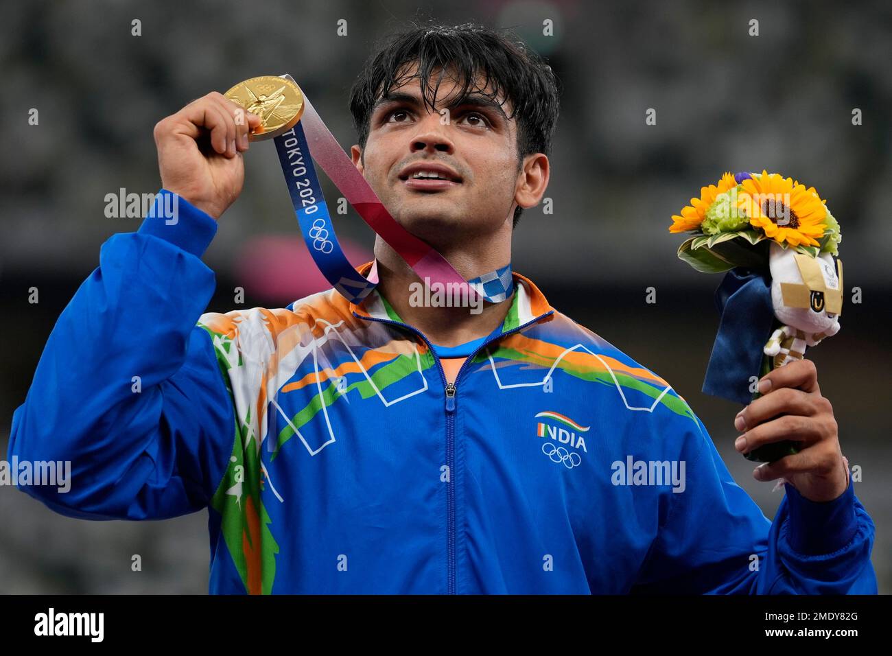 Gold medalist Neeraj Chopra, of India, poses during the medal ceremony ...