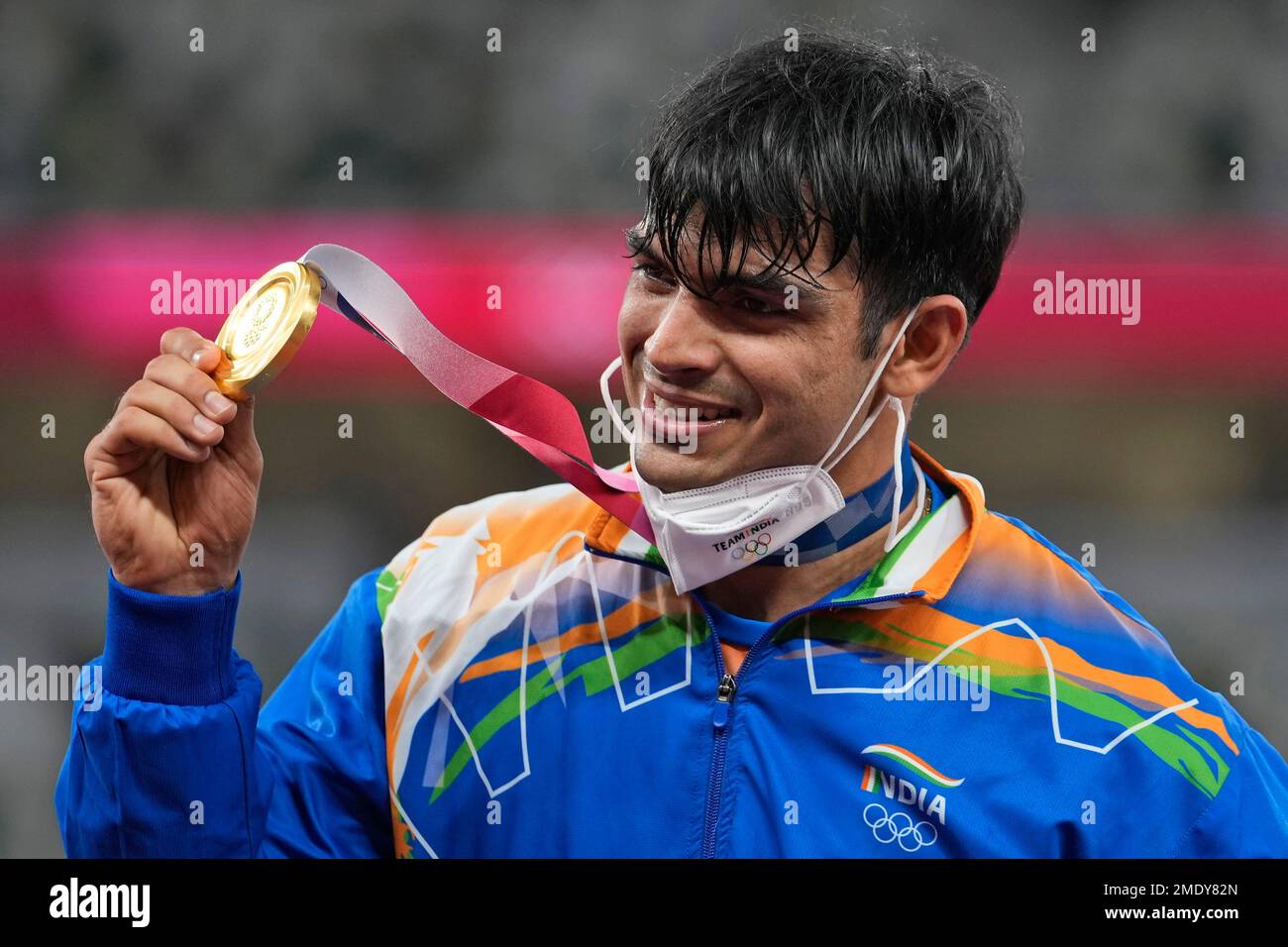 Gold medalist Neeraj Chopra, of India, poses during the medal ceremony ...
