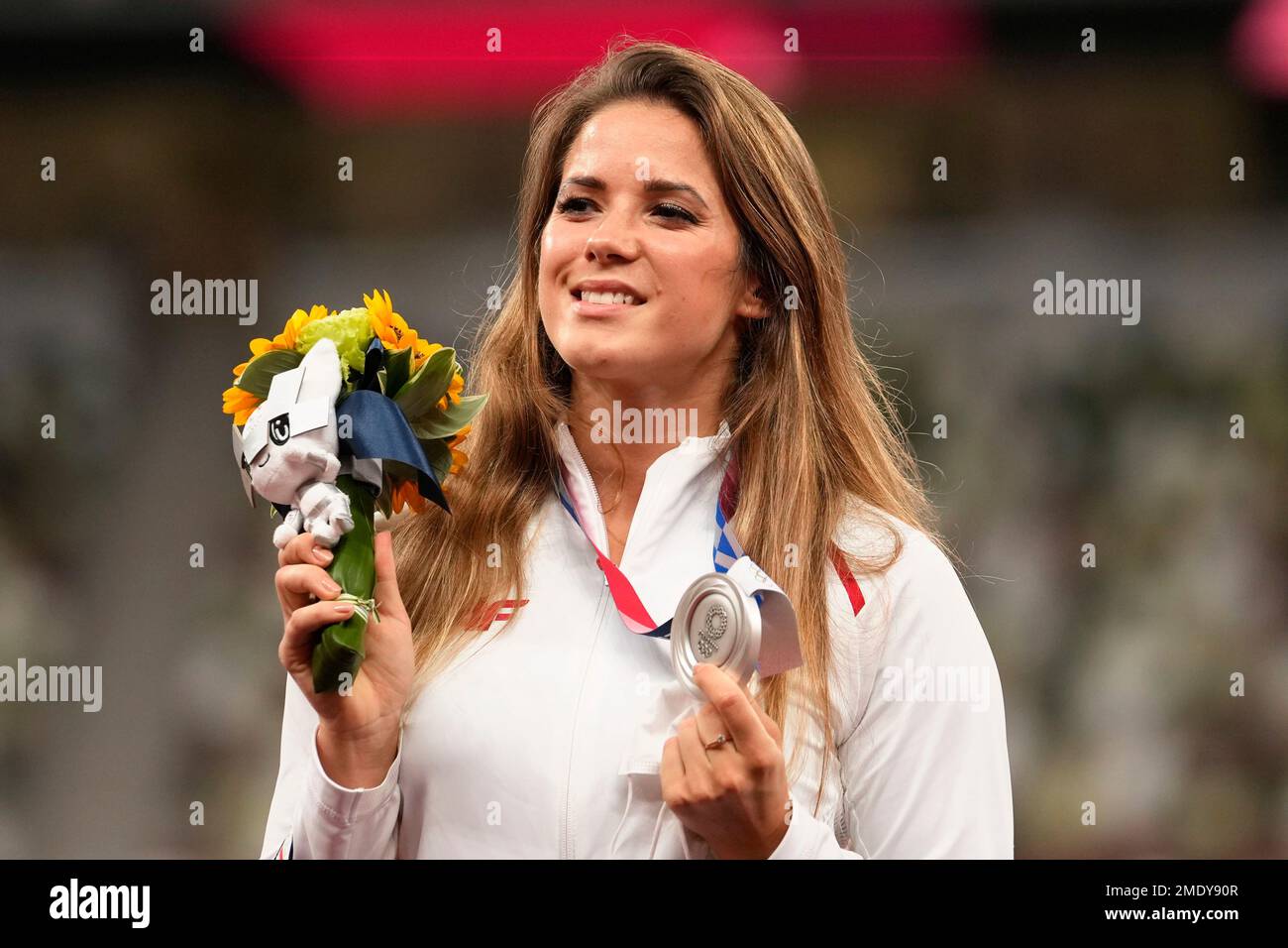Silver medalist Maria Andrejczyk, of Poland, poses on the podium during ...