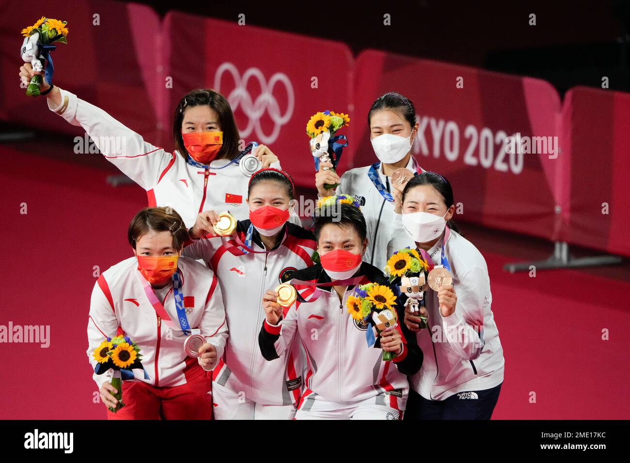 From left: Silver medalist China's Chen Qing Chen and Jia Yi Fan, gold ...