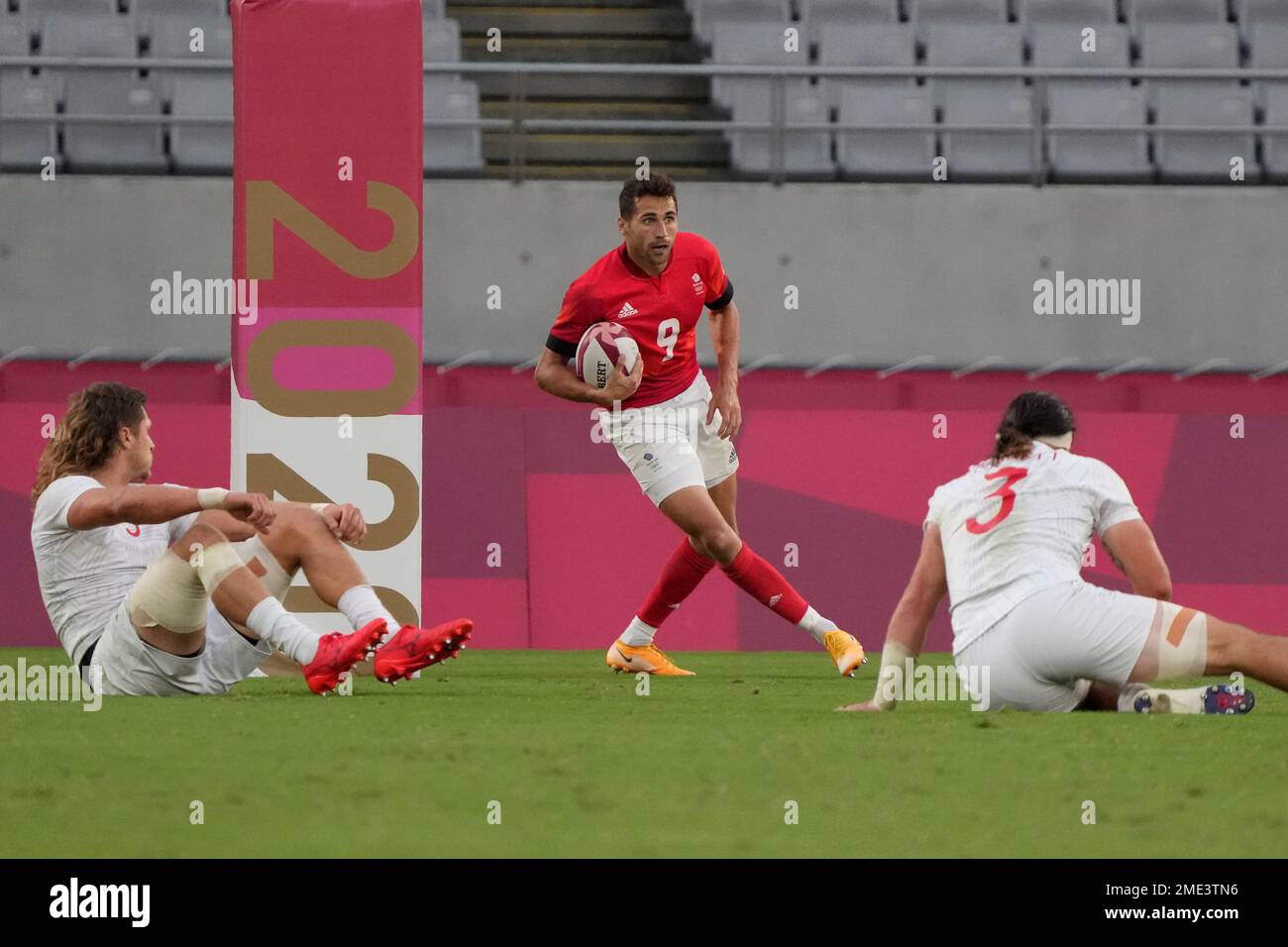 Joe Schroeder, left, and Danny Barrett of the United States rest on the ...