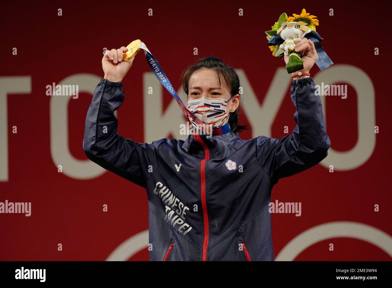 Kuo Hsing-Chun of Taiwan cries as she celebrates on the podium after ...