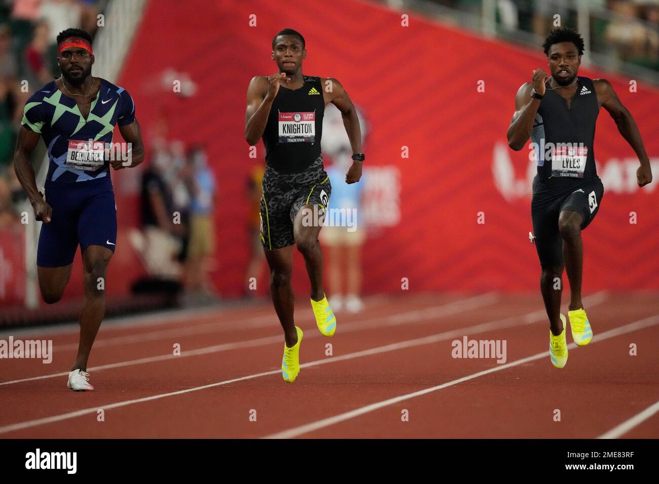 FILE - In this June 27, 2021, file photo, Noah Lyles, right, wins the final in the men's 200 ...