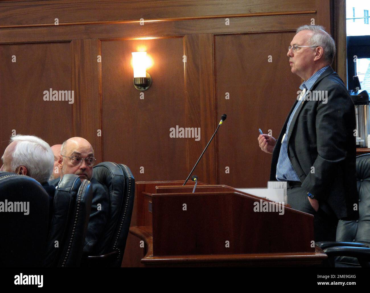 Alaska state Rep. Bryce Edgmon, right, speaks on the floor of the state ...