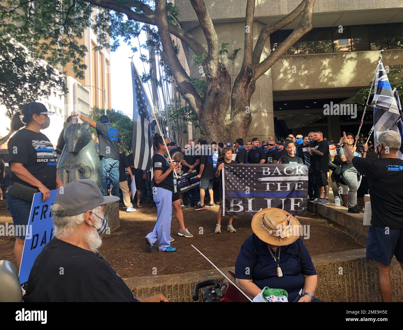 Supporters of three Honolulu police officers charged in connection with ...