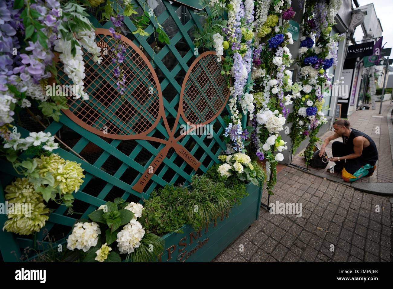 A tennis themed display is put up at a bar in Wimbledon, as ...