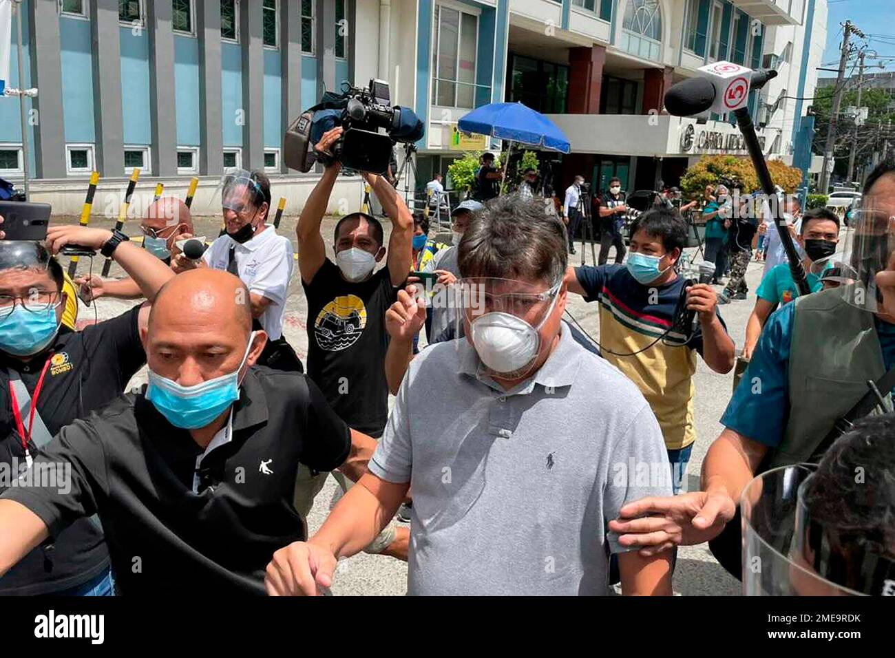 Former senator Francis “Kiko” Pangilinan, center, leaves Capitol ...