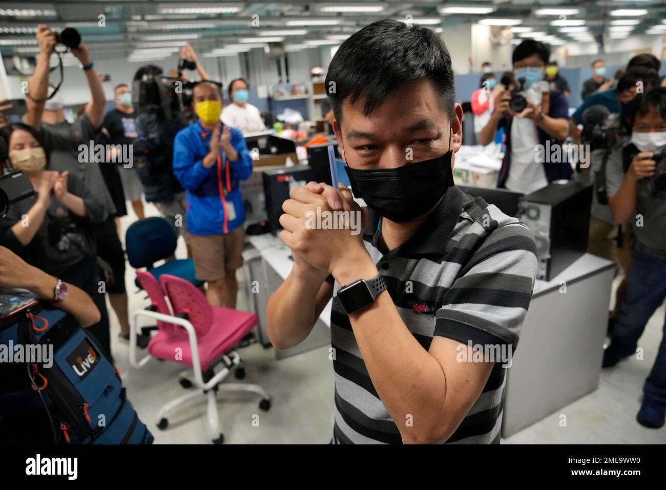 Lam Man-chung, Executive Editor-in-Chief of Apple Daily gesture at the ...