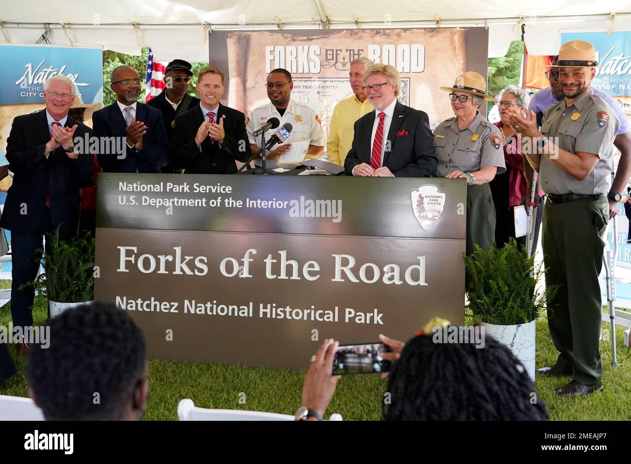 Natchez Mayor Dan Gibson, third from right, and elected officials join ...