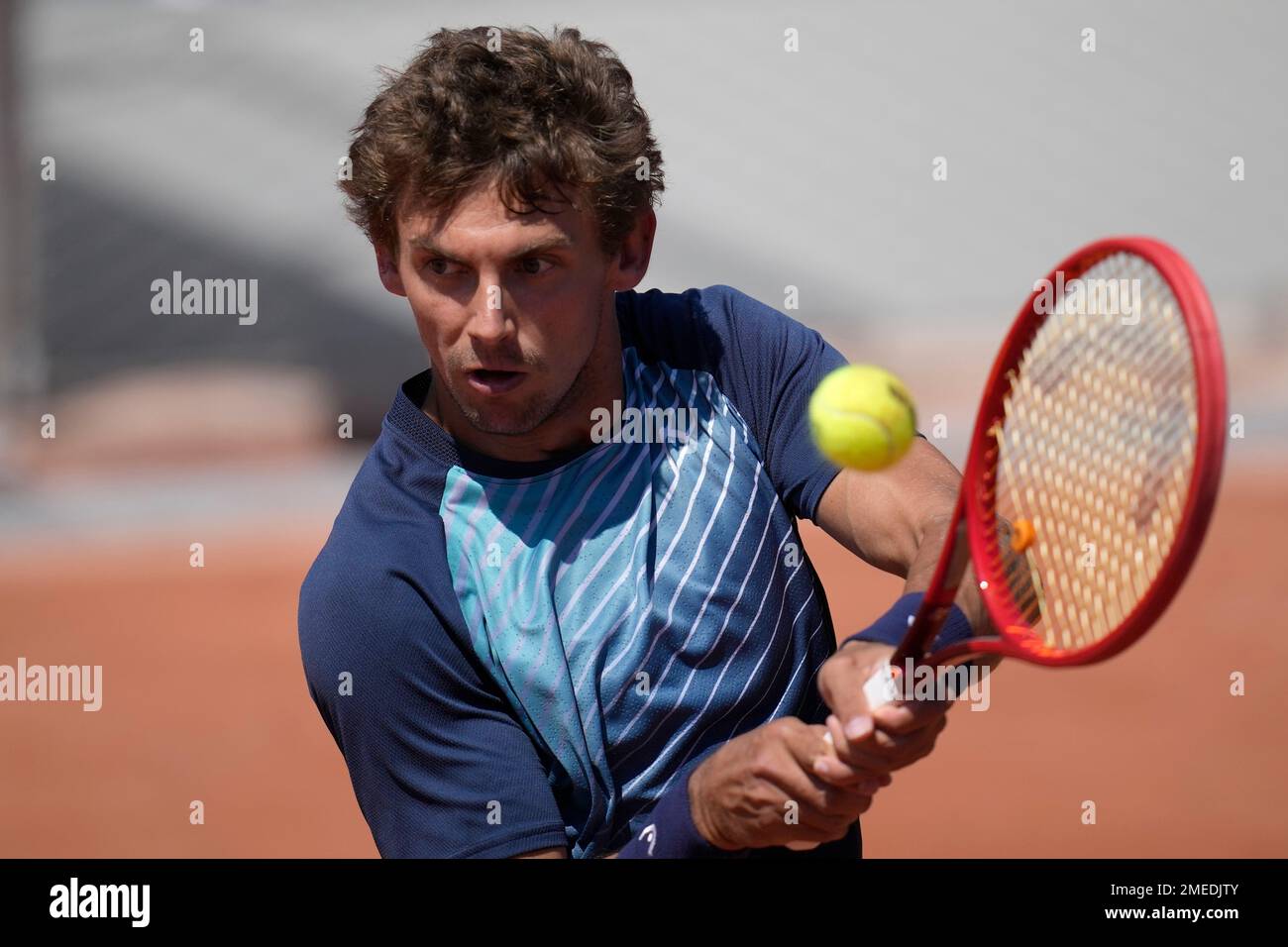 Switzerland's Henri Laaksonen returns the ball to Germany's Yannick ...