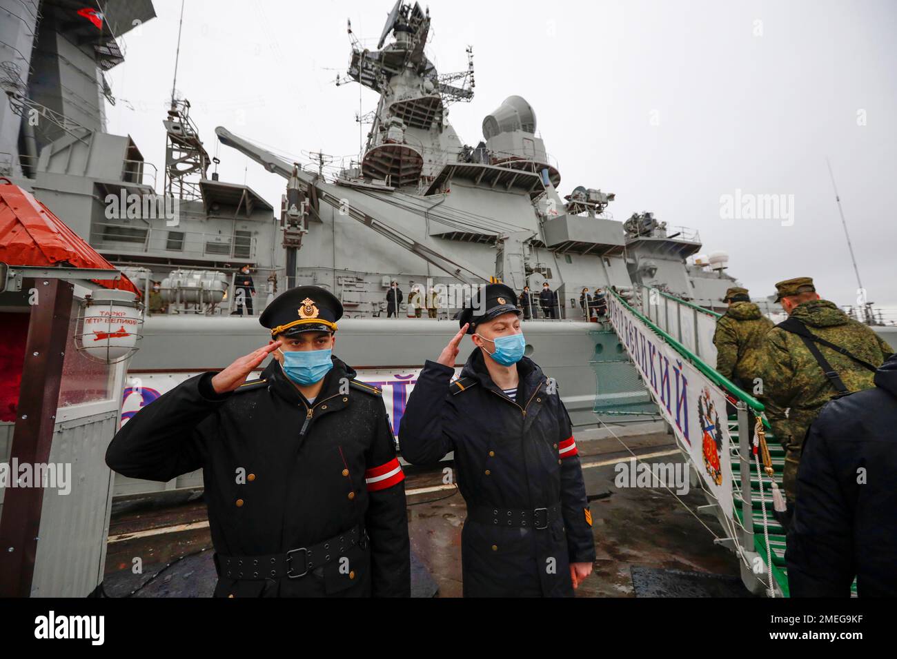 Russian sailors salute as they stand guard at the Northern Fleet's ...