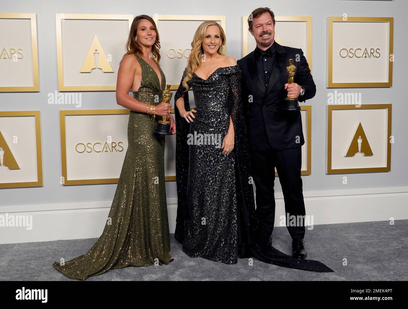 Pippa Ehrlich, from left, winner of the award for best documentary ...