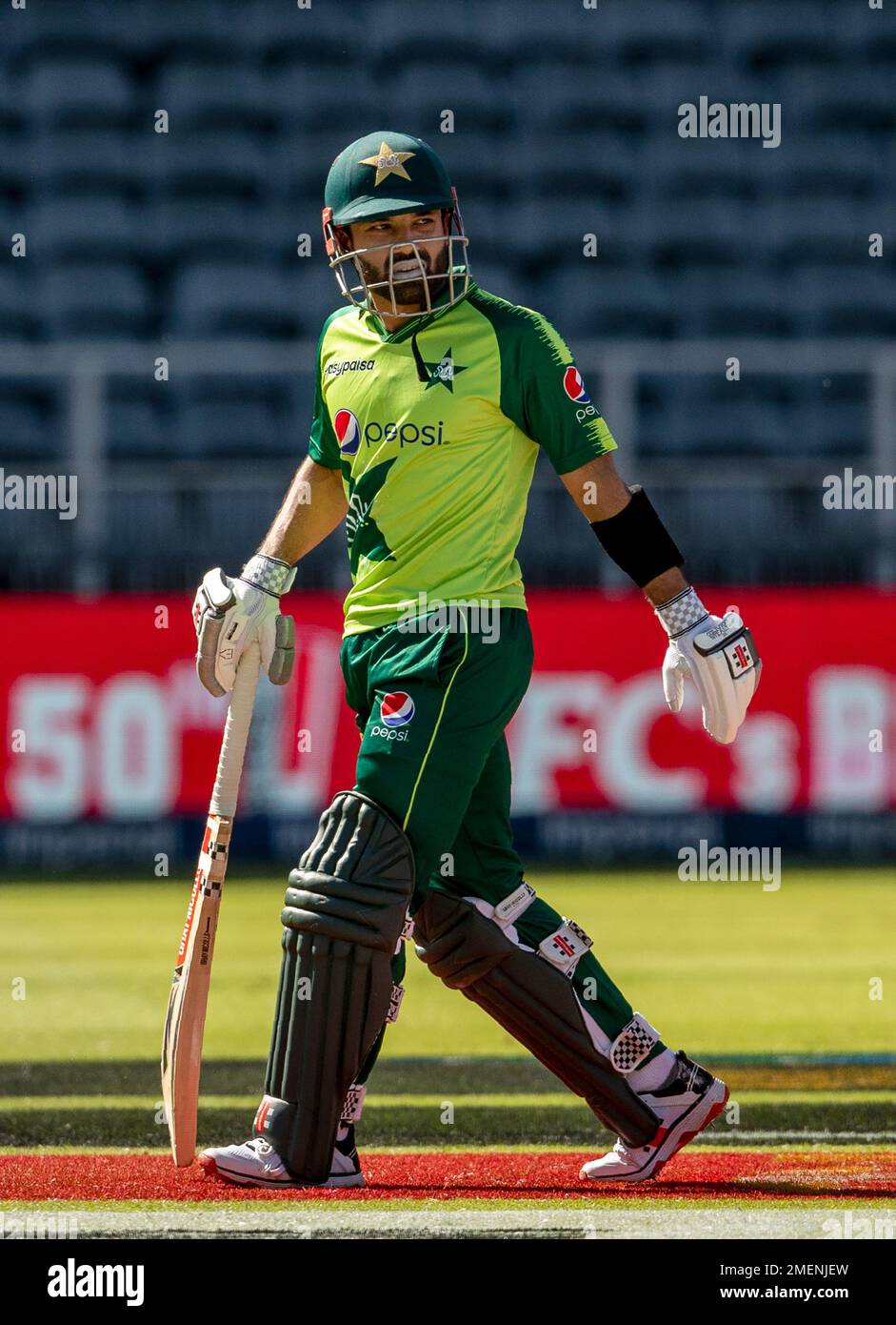 Pakistan's batsman Mohammad Rizwan leaves the crease after being ...