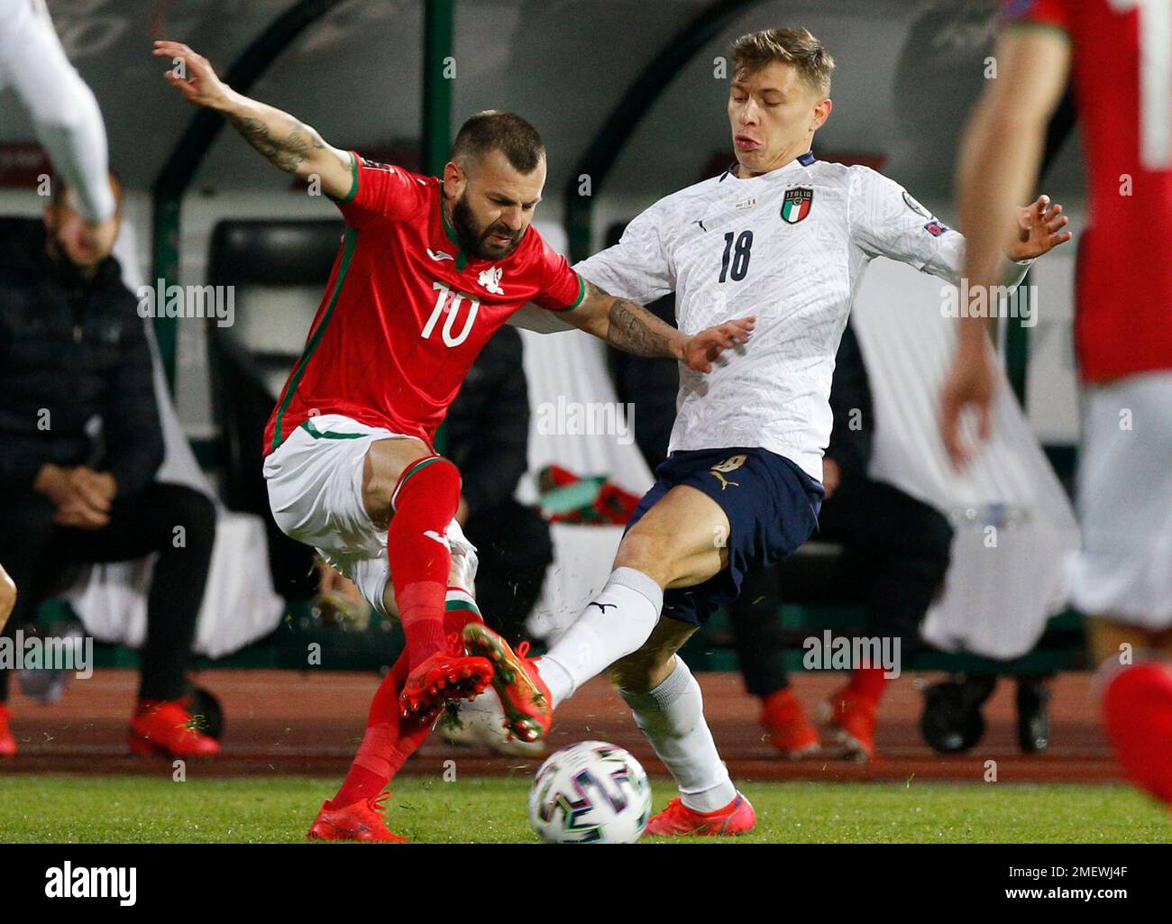 Bulgaria's Spas Delev, left, challenges Italy's Nicolo Barella, right ...