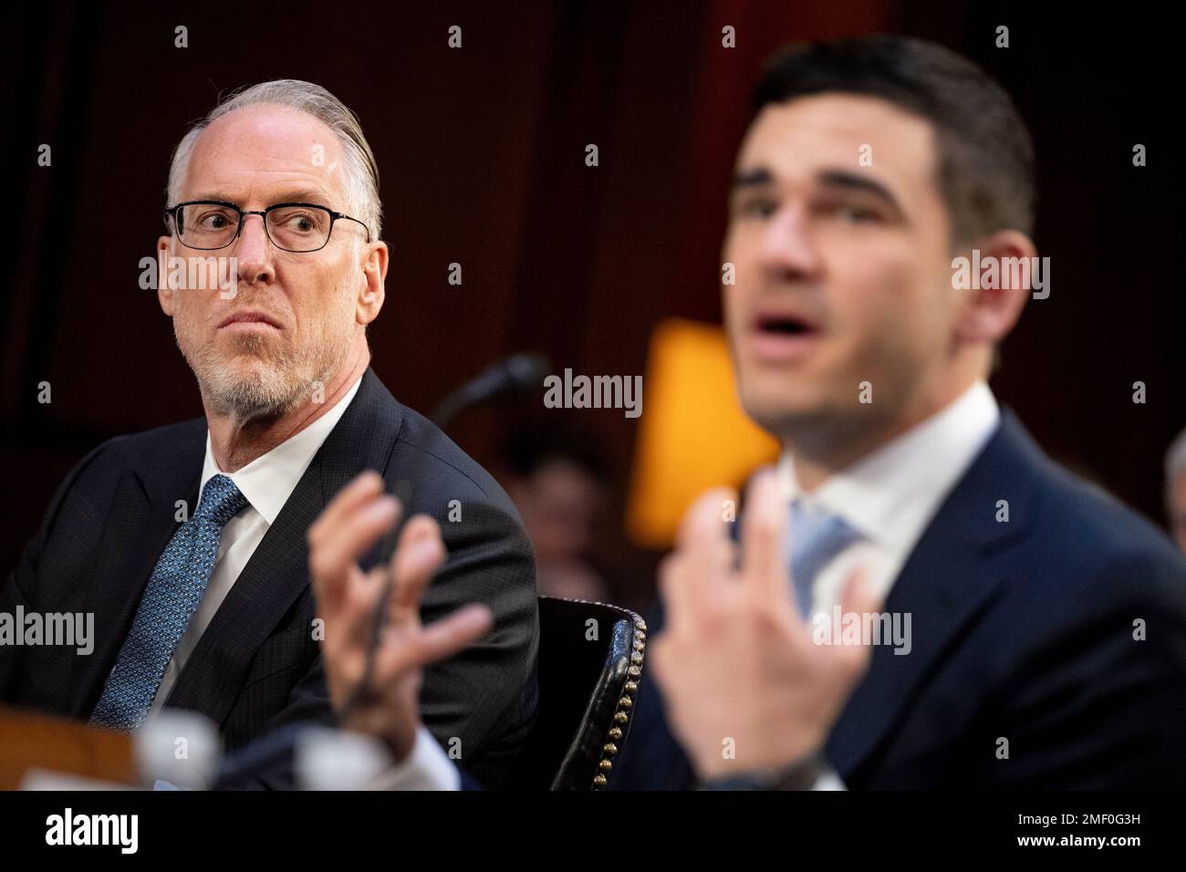 SeatGeek, Inc. Chief Executive Officer Jack Groetzinger, right, accompanied by Live Nation ...