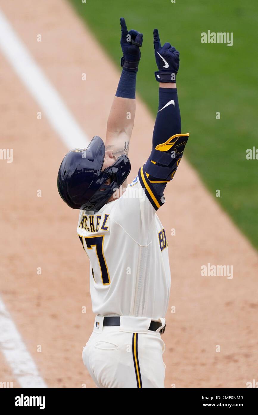 Milwaukee Brewers' Garrett Mitchell (77) celebrates after hitting a ...
