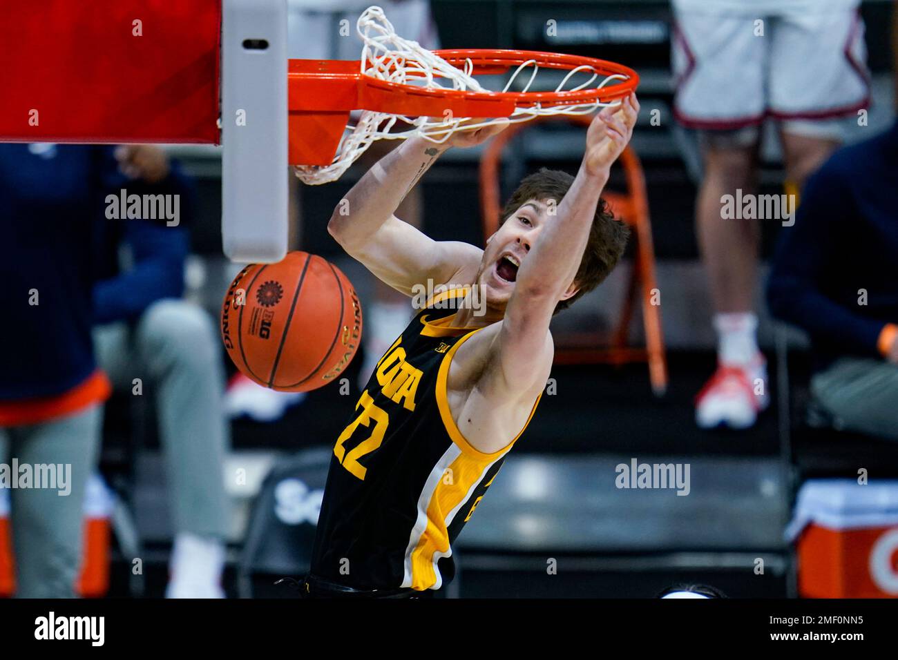 Iowa forward Patrick McCaffery (22) gets a dunk against Illinois in the ...