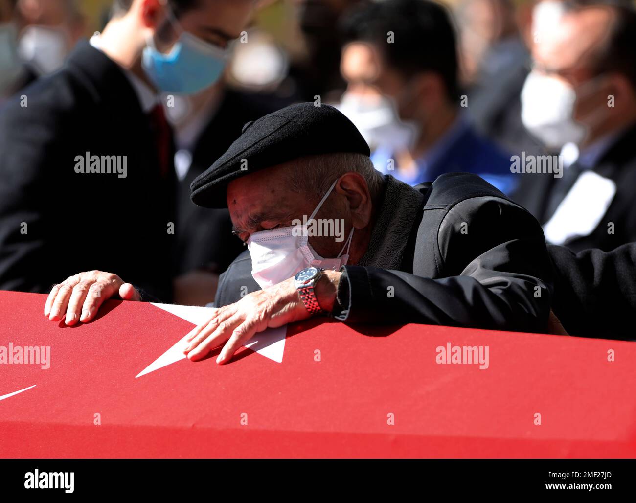 A father embraces the coffin of his son as Turkish leaders, army ...