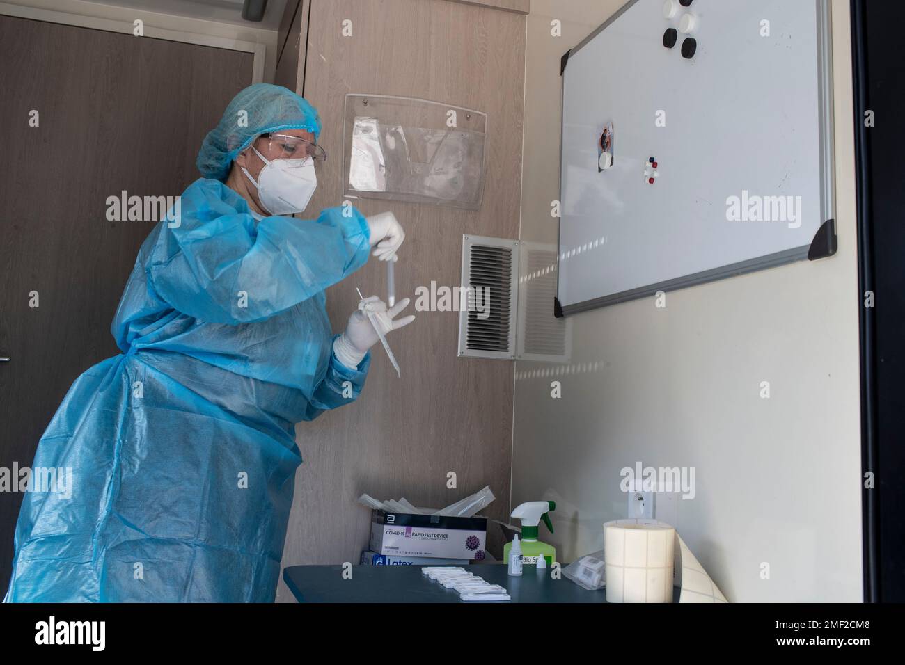 A member of the medical staff of the National Health Organisation (EODY ...