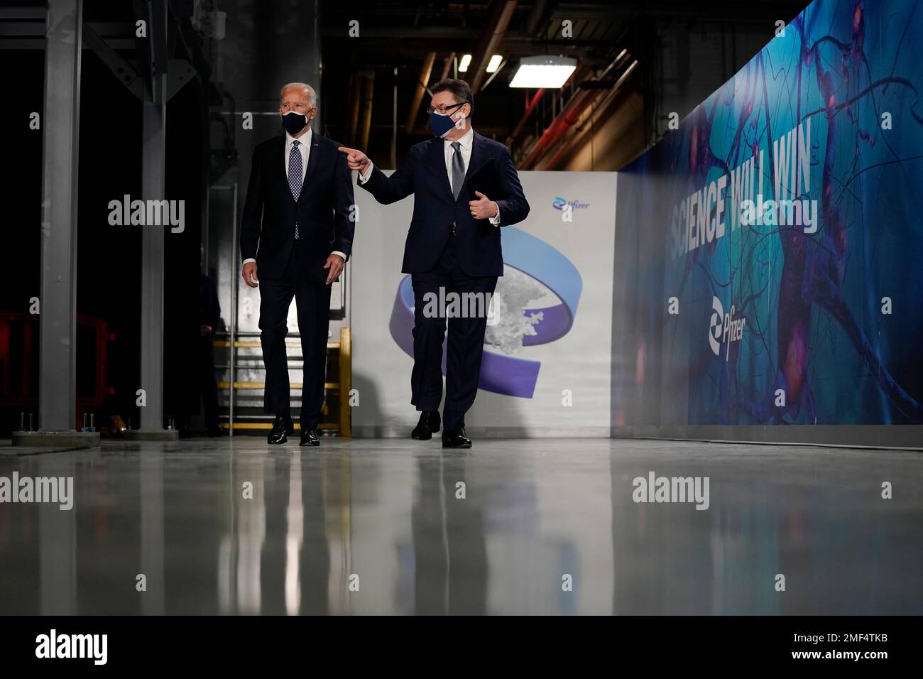 President Joe Biden walks with Albert Bourla, Pfizer CEO, right, as he ...