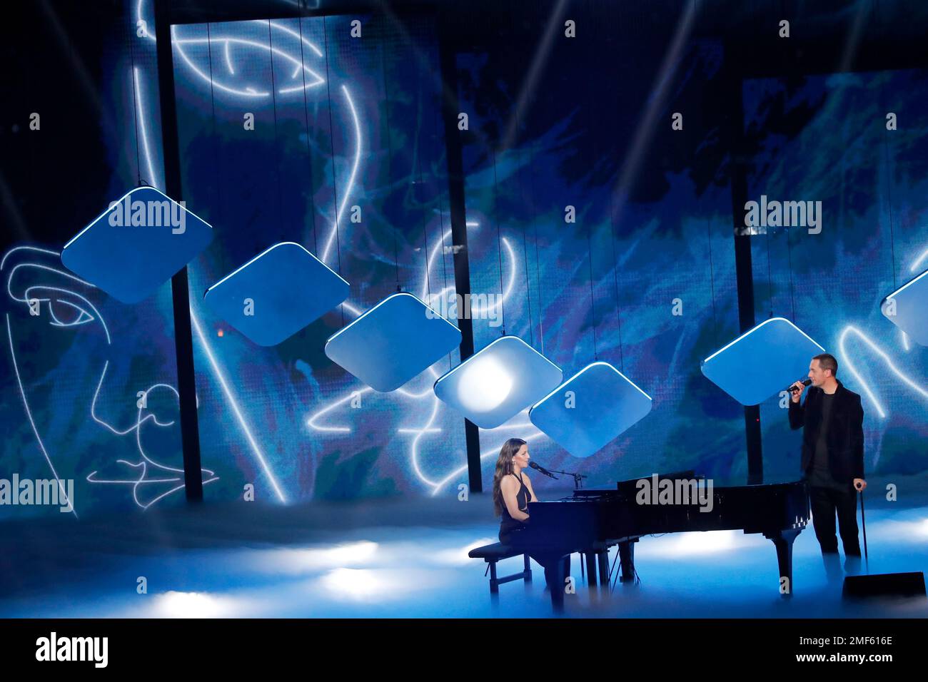 French singer Fabien Marsaud aka Grand Corps Malade, right, and French ...