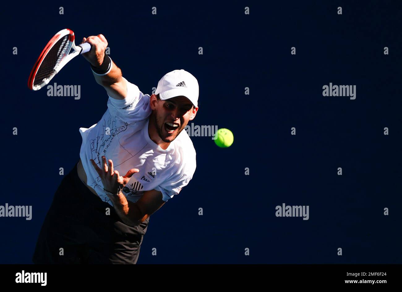 Austria's Dominic Thiem serves Germany's Dominik Koepfer during their ...