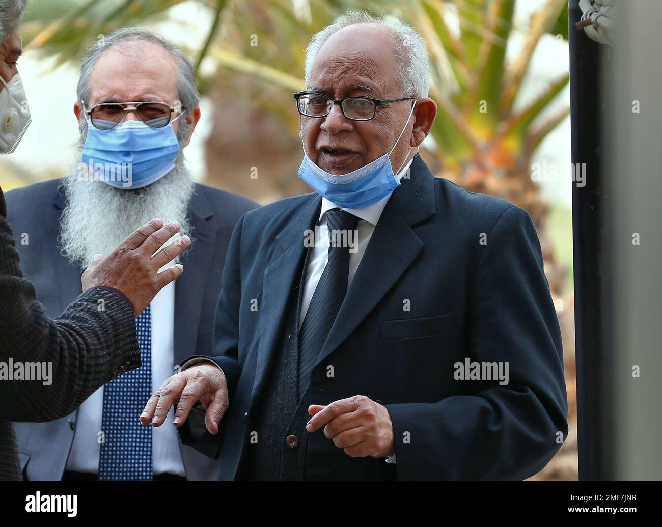 Ahmed Saeed Sheikh, center, father of British-born Pakistani Ahmed Omar ...