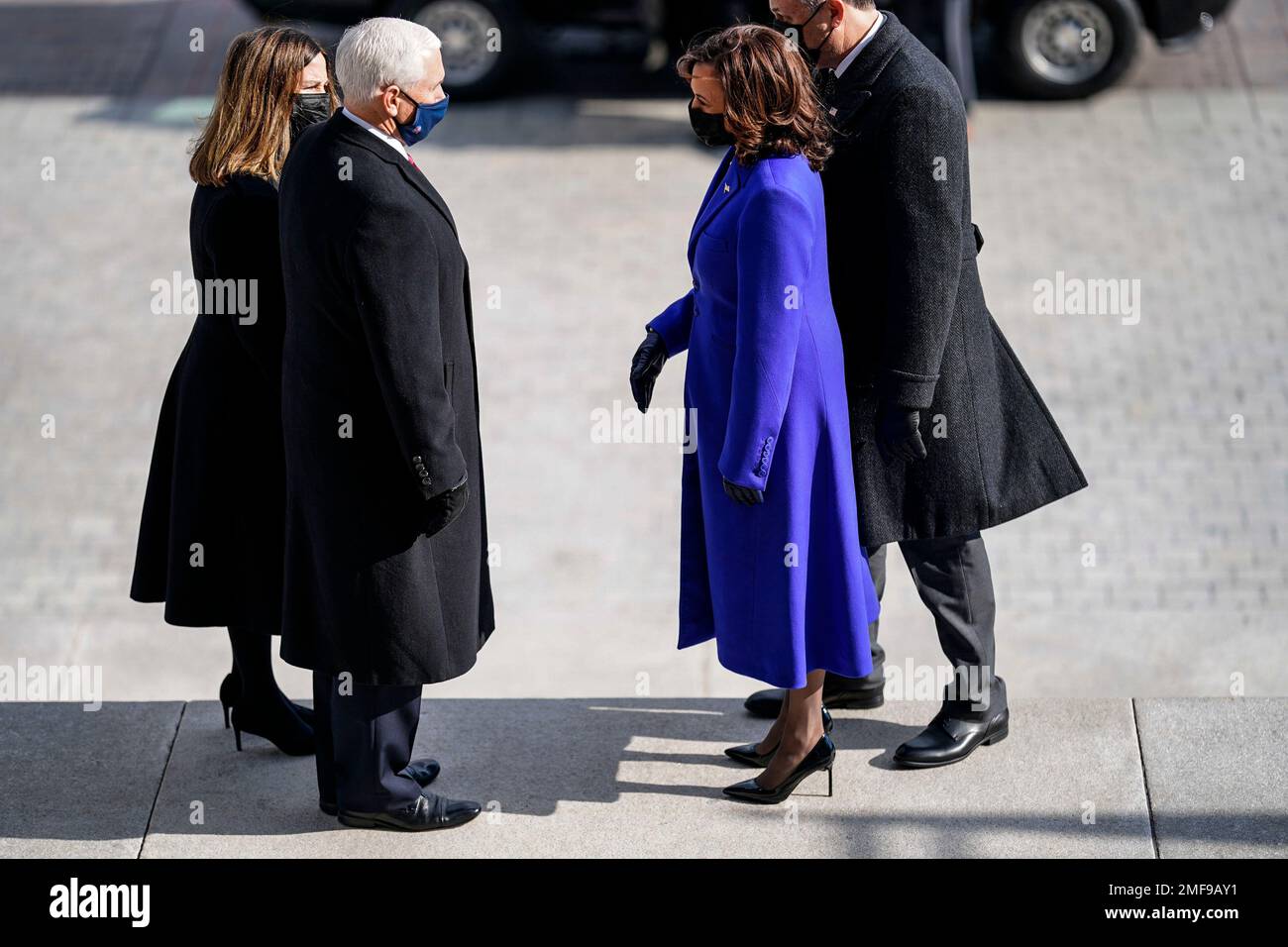 Vice President Kamala Harris, second right, and her husband, second ...
