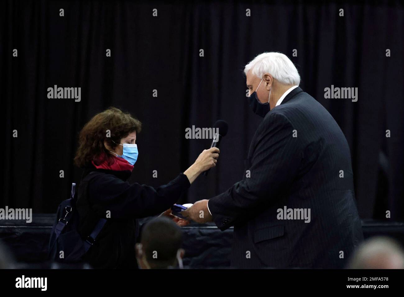 West Virginia Gov. Jim Justice, right, presents Victoria Yeager, the ...