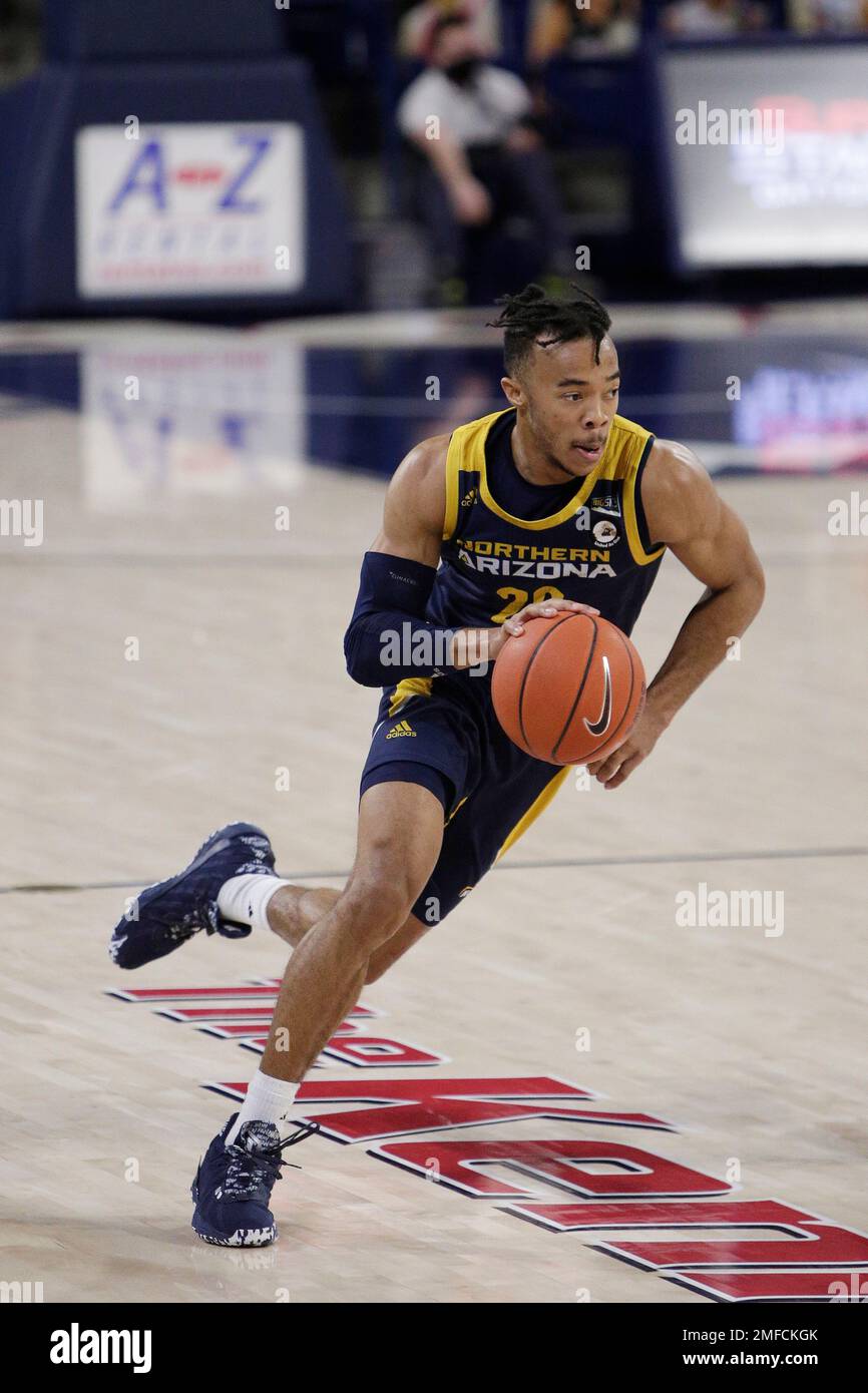 Northern Arizona guard Cameron Shelton dribbles the ball during the ...