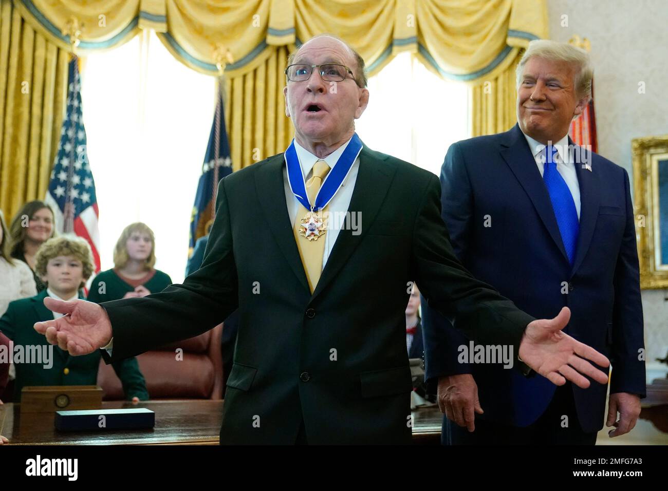 Olympic gold medalist and former University of Iowa wrestling coach Dan ...