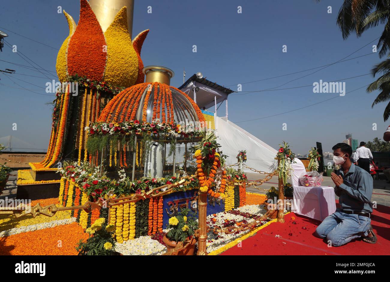 A man offers prayers at Chaitya Bhoomi, a memorial to Indian freedom ...