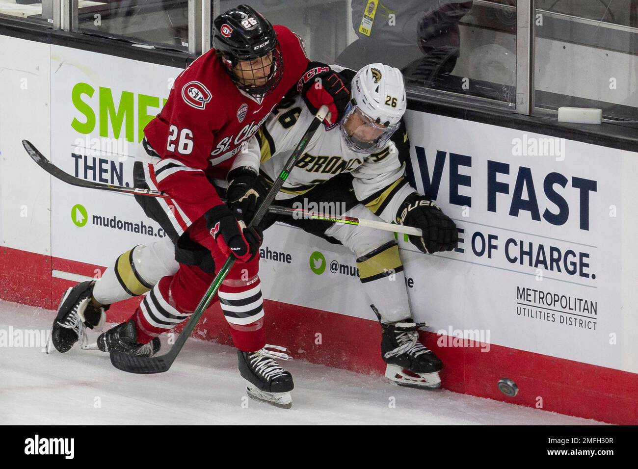 St. Cloud State forward Easton Brodzinski (26) smashes Western Michigan ...
