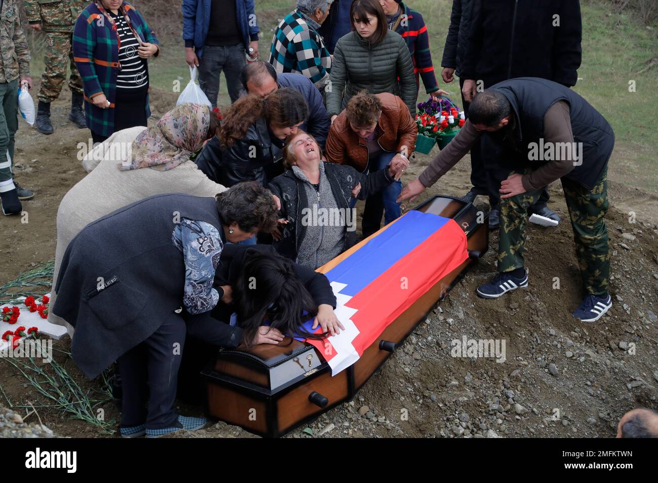 Relatives of Mkhitar Beglarian, an ethnic Armenian soldier of Nagorno ...