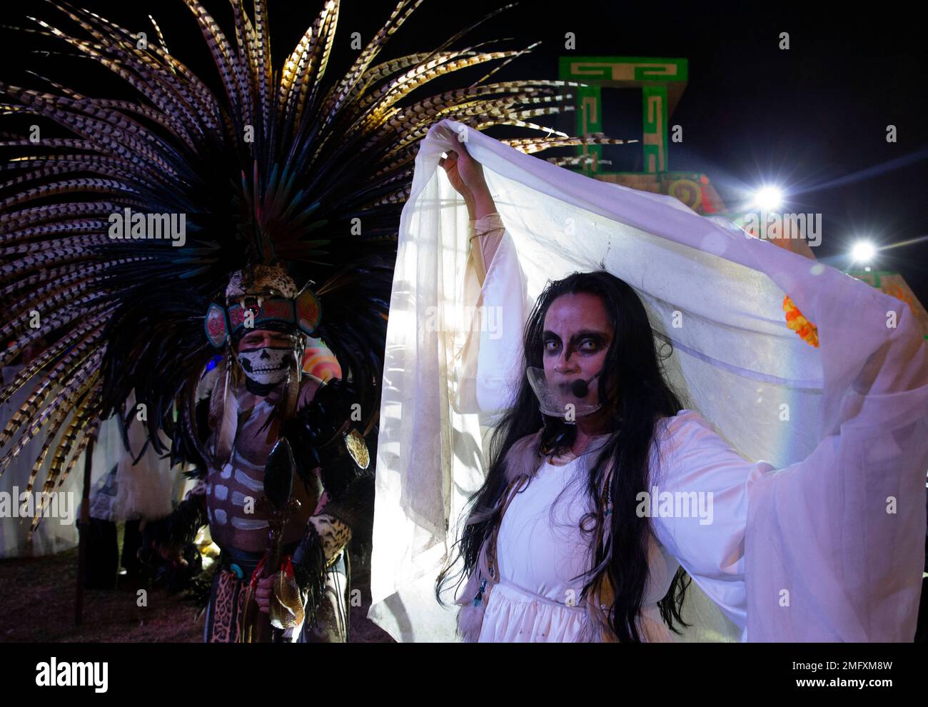 Actress Nayeli Cortes dressed as the La Llorona character, carries a ...