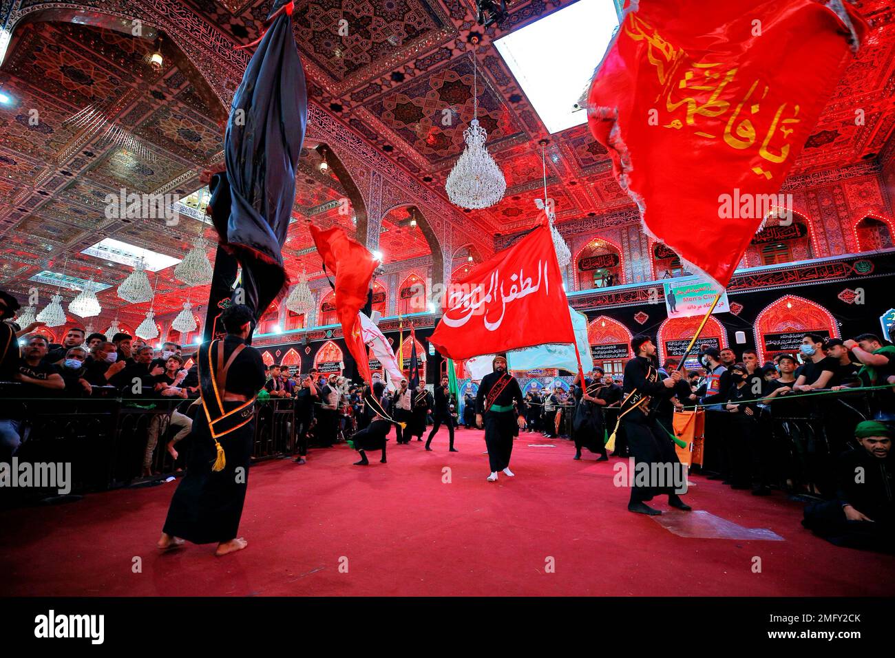 Shiite worshippers gather inside the holy shrine of Imam Abbas ahead of ...