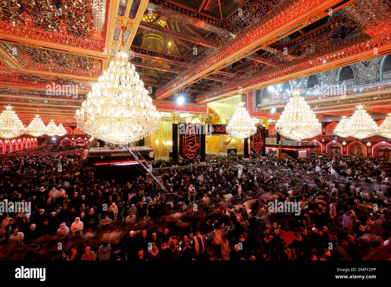 Shiite worshippers gather inside the holy shrine of Imam Abbas ahead of ...