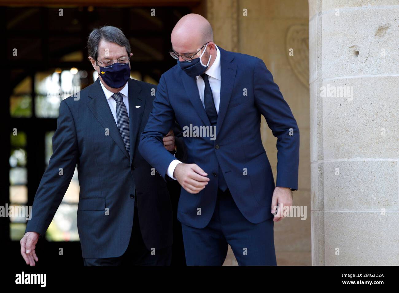European Union Council President Charles Michel, right, is greeted by ...