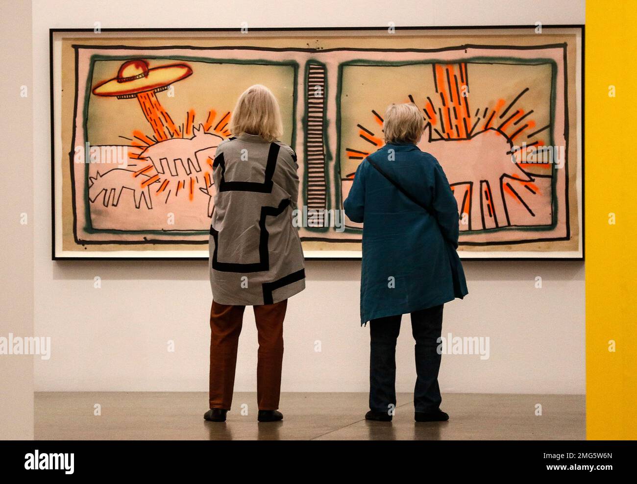 Visitors watching artwork by US artist Keith Haring during an ...