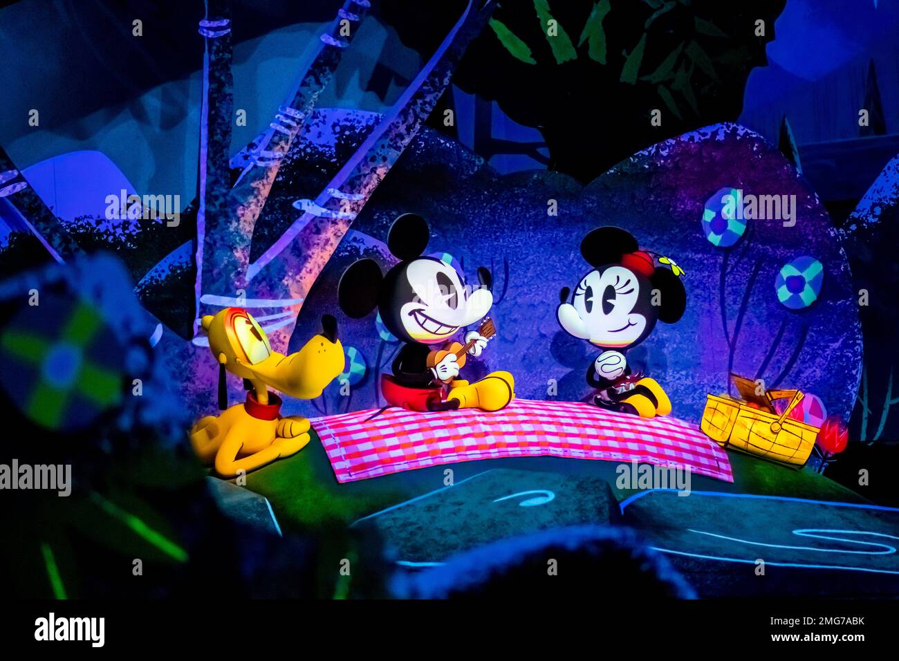 Disney characters Pluto, Mickey Mouse and Minnie Mouse are seen in the ...