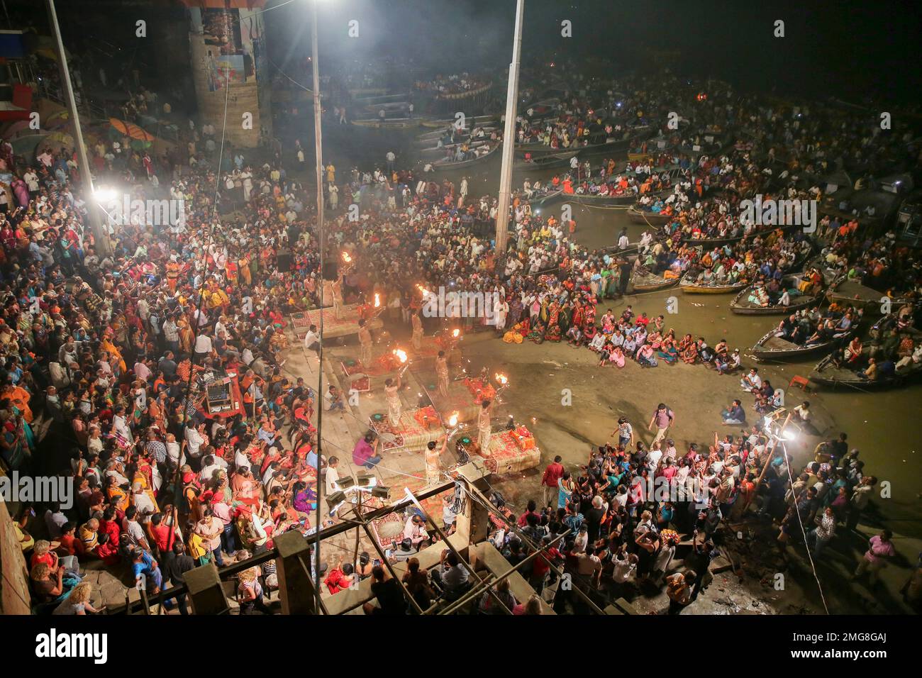 A crowd gathers for a prayer ceremony dedicated to the river Ganges in ...