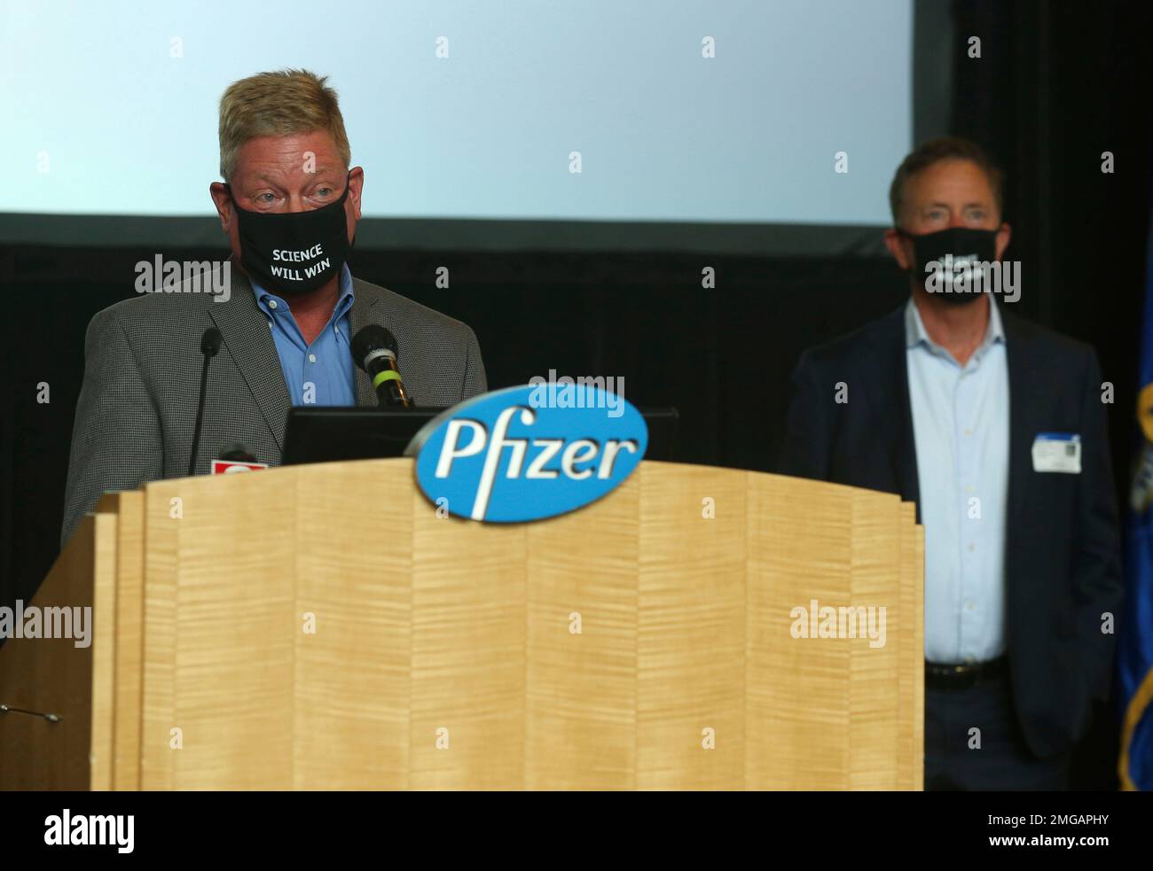 John Burkhardt, left, senior vice president of drug safety R&D and head ...